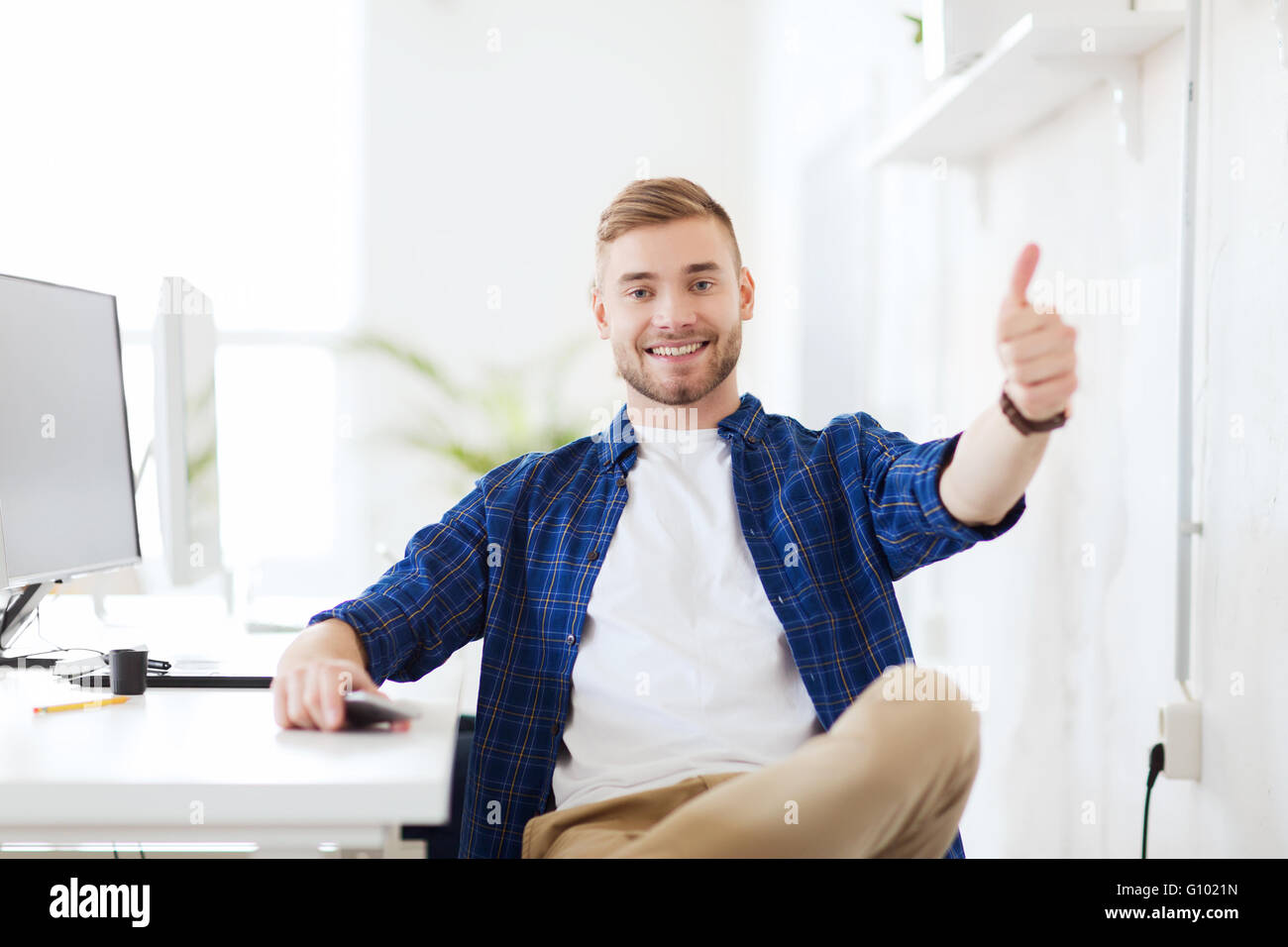 Thumbs up young creative man hi-res stock photography and images - Alamy