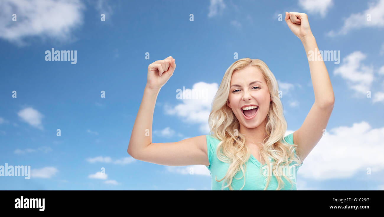 happy young woman or teen girl celebrating victory Stock Photo - Alamy