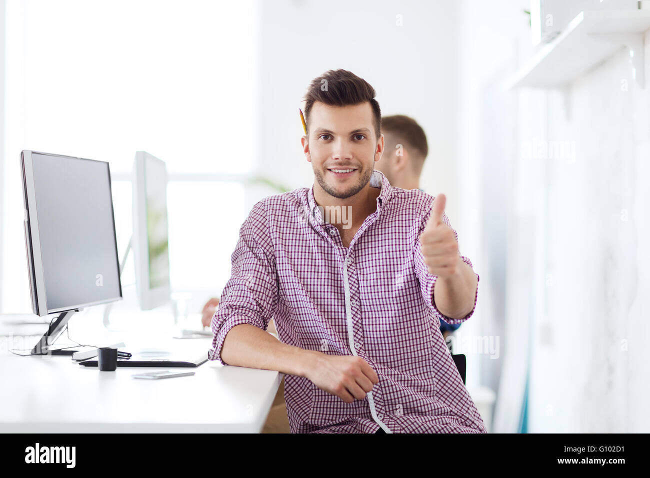 happy creative man with computer at office Stock Photo - Alamy