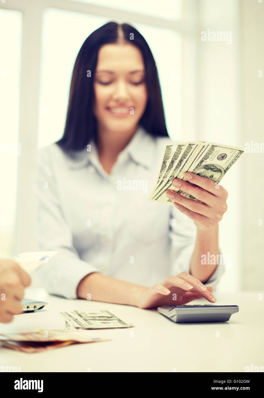 Happy counting money hi-res stock photography and images - Alamy