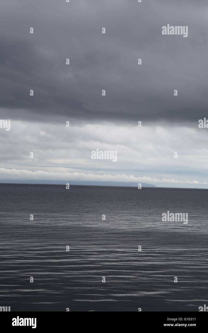Stormy, grey, Irish sea with dark clouds, Antrim, Ireland Stock Photo ...