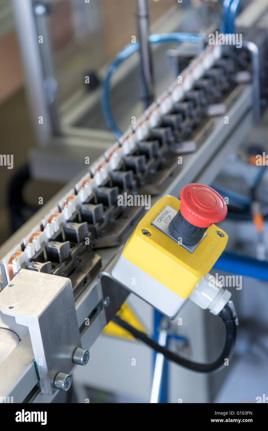 Empty conveyor of the assembly line in assembly factory. Focused on the ...