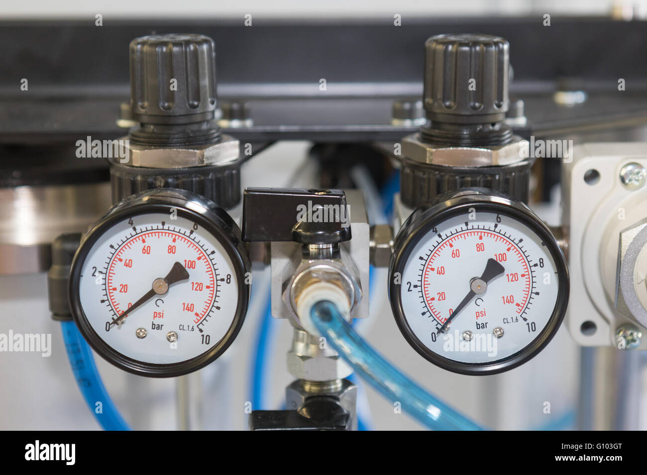 Closeup view of indicators to pressure measurement in assembly line ...