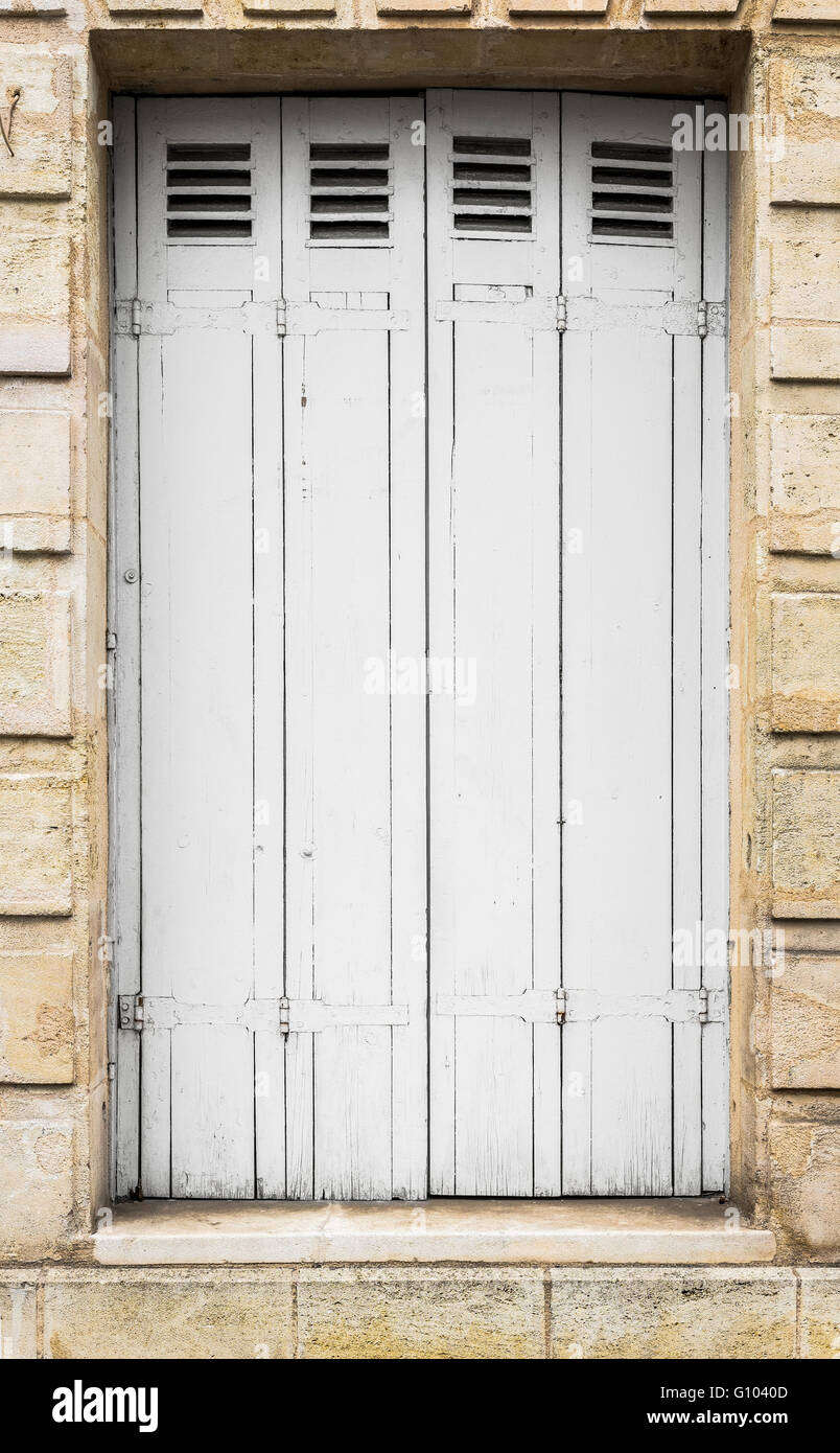 Weathered white wooden window panel with a rusty metal hinges Stock ...