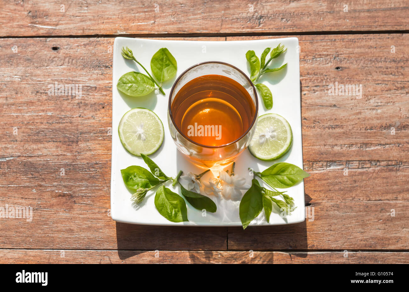 tea object with wood background Stock Photo - Alamy