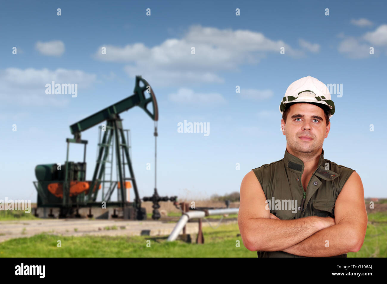 oil worker posing on oil field Stock Photo - Alamy