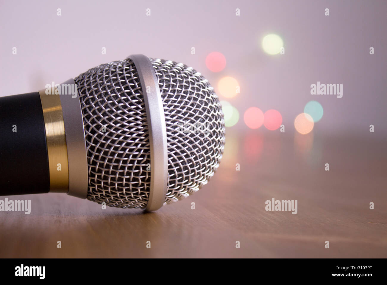 Top of a microphone on gray background with bright colors Stock Photo ...