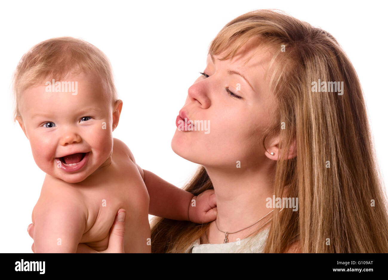 woman is holding her baby Stock Photo - Alamy
