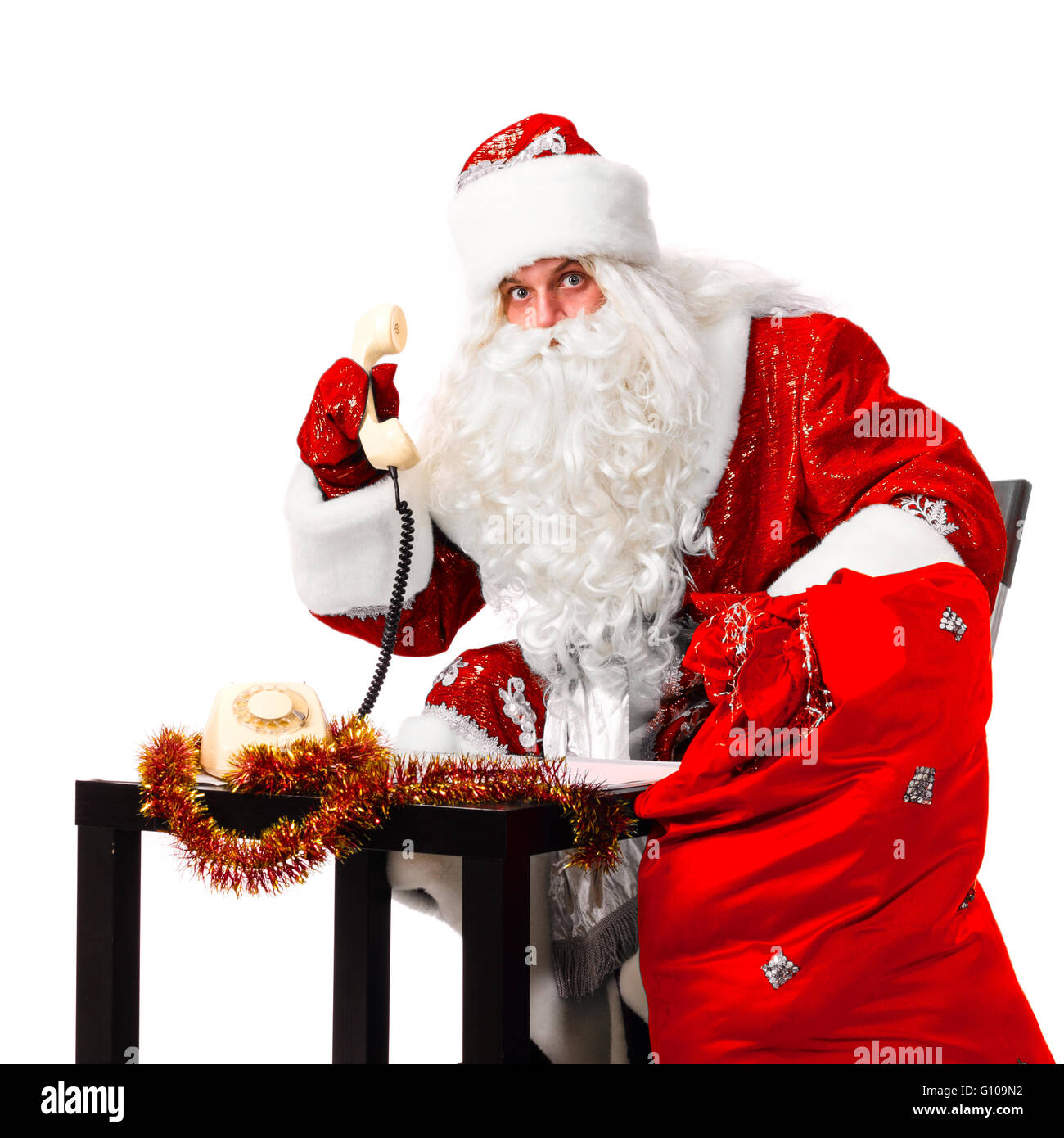 Modern santa claus listening christmas hi-res stock photography and ...