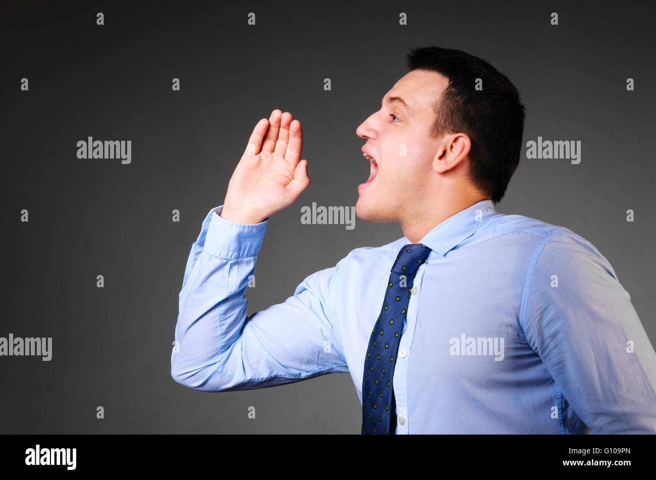 businessman is screaming Stock Photo - Alamy