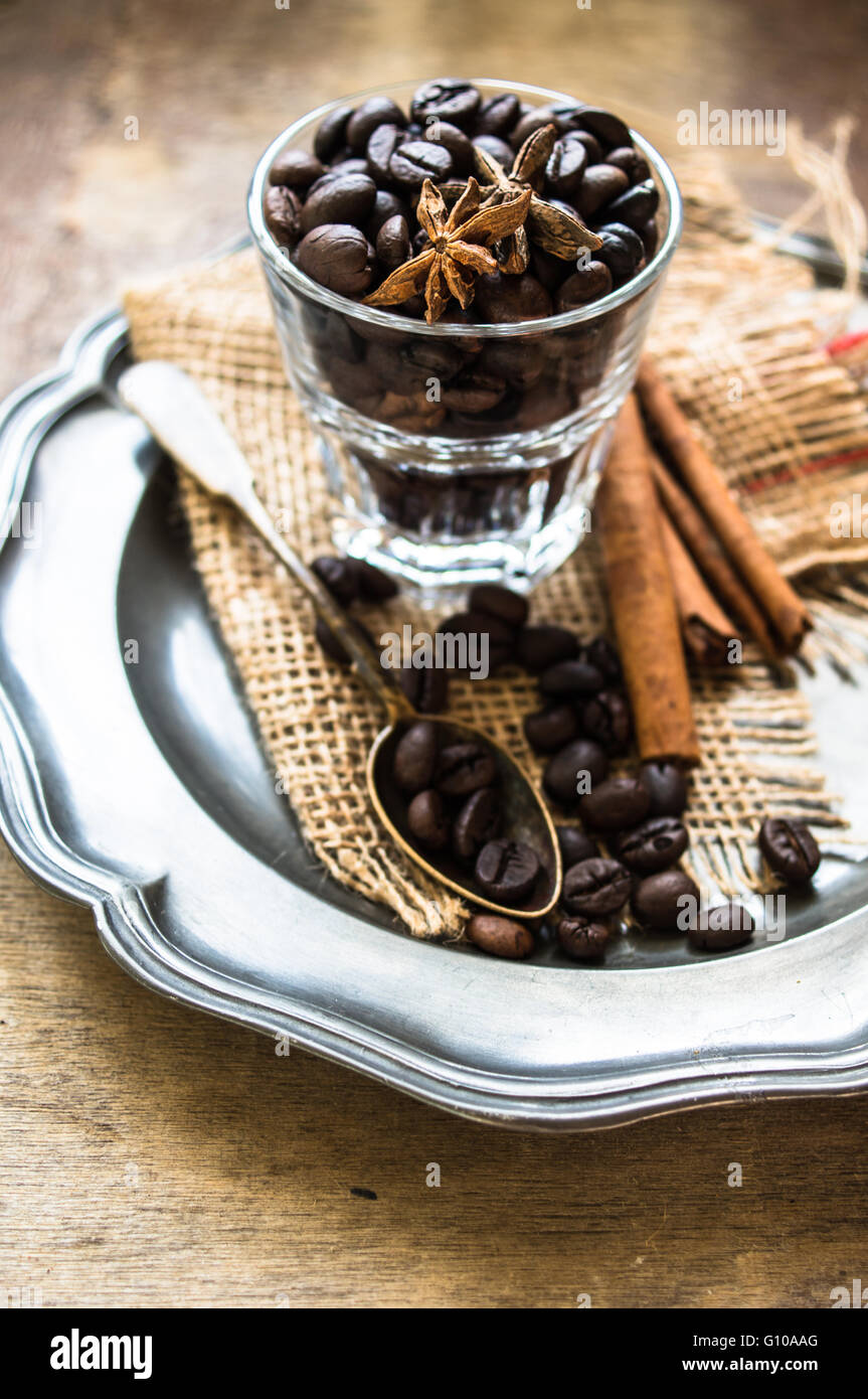 Coffee beans on rustic background Stock Photo - Alamy