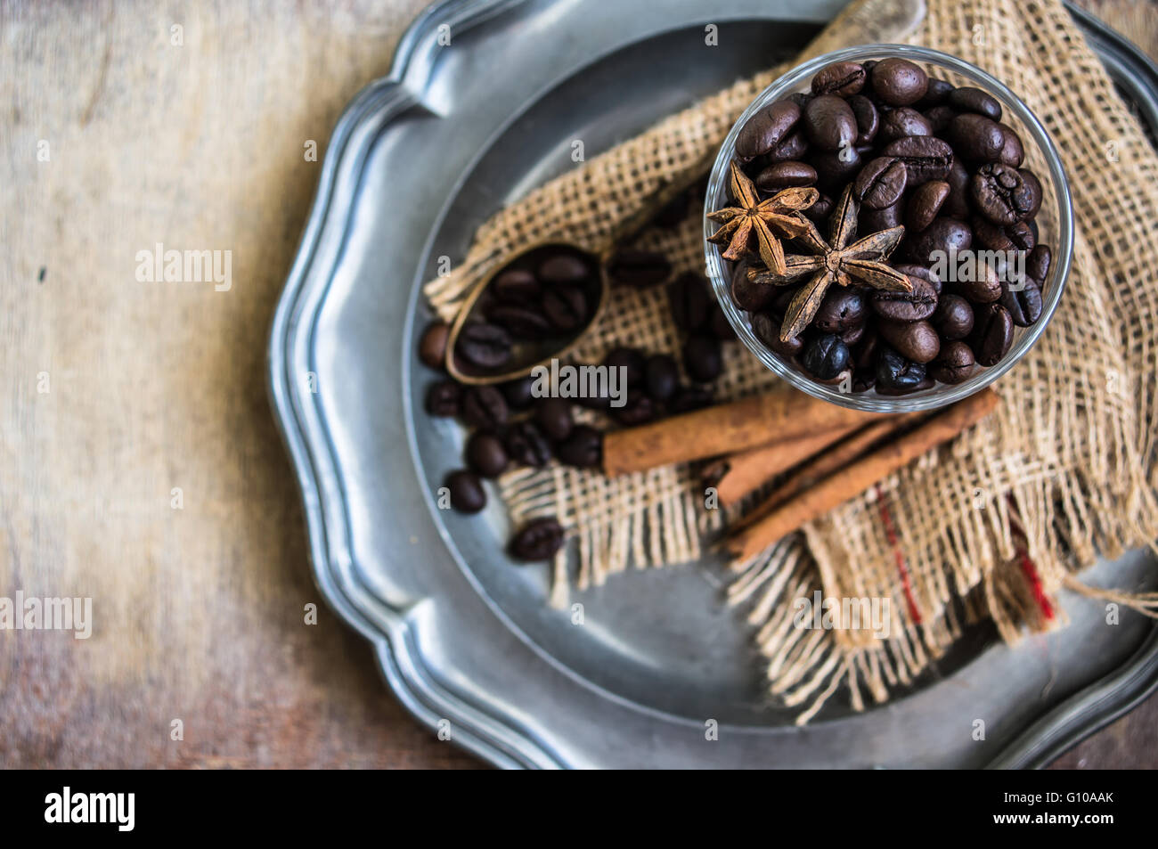 Coffee beans on rustic background Stock Photo - Alamy