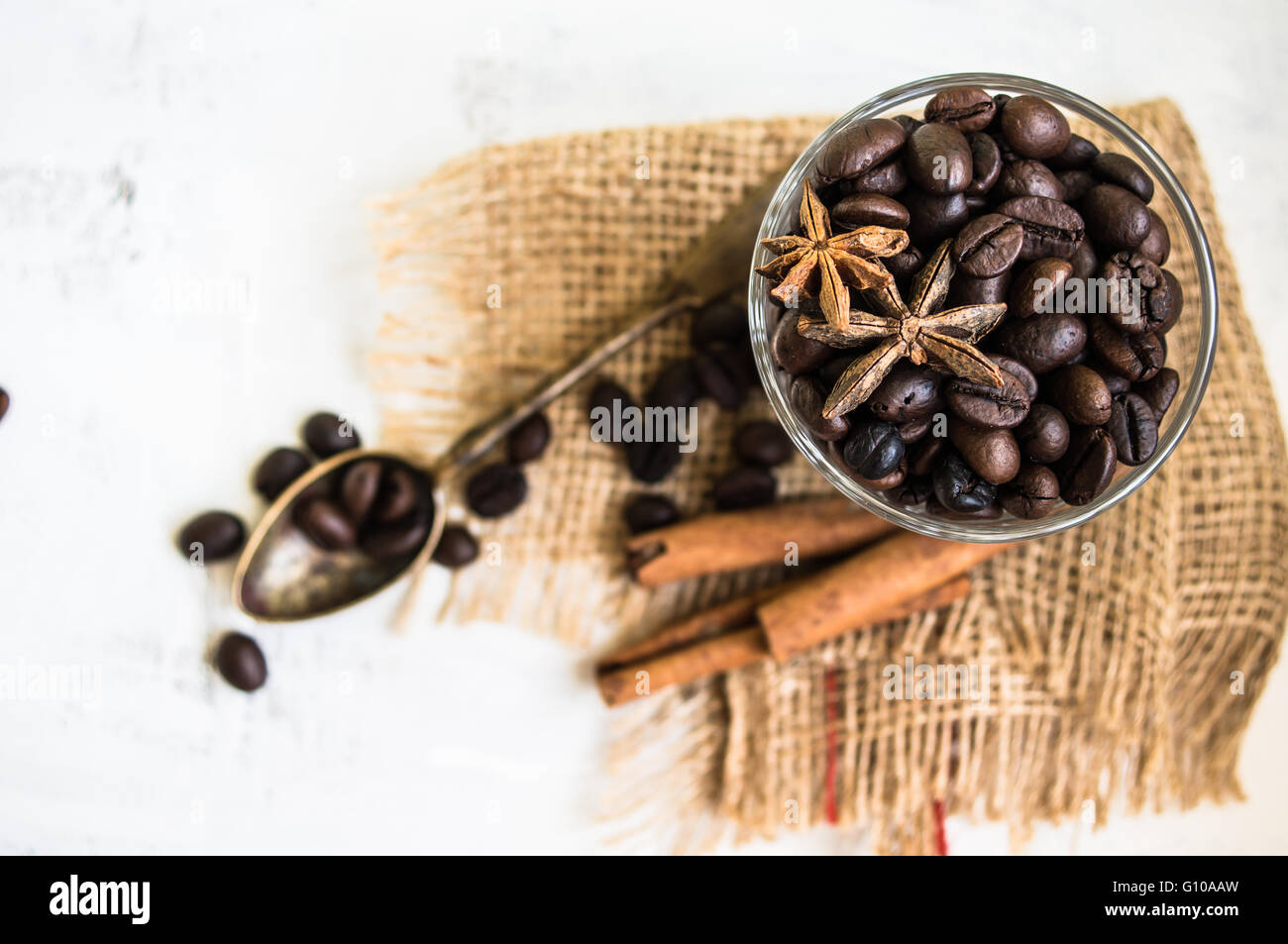 Coffee beans on rustic background Stock Photo - Alamy