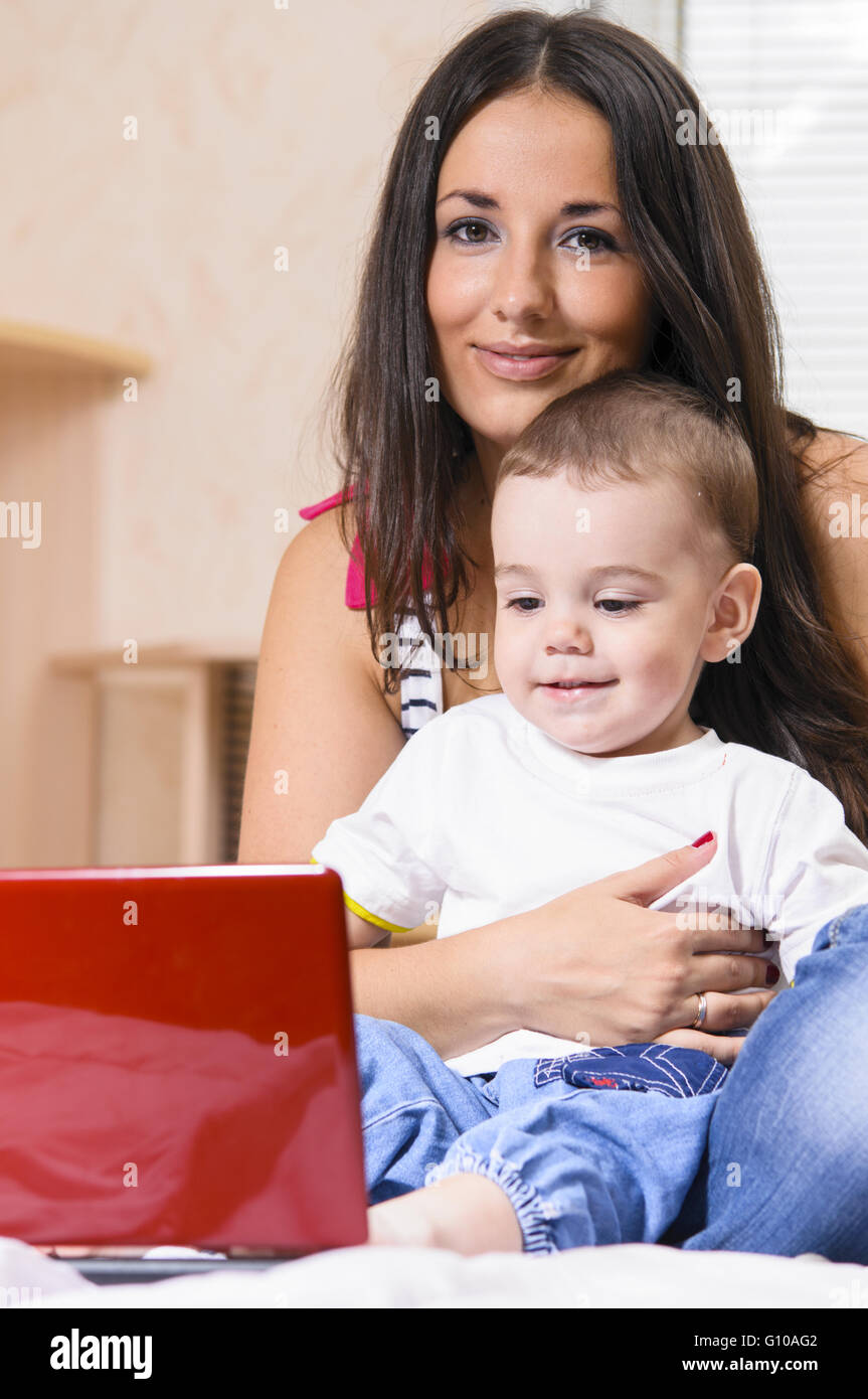 mother and son are using laptop Stock Photo - Alamy