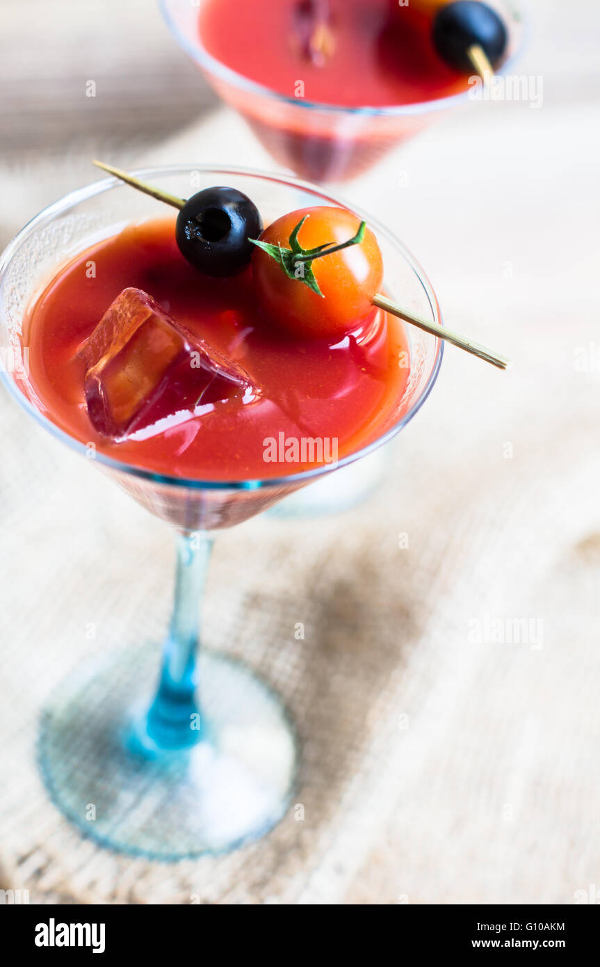 Bloody Mary cocktail with cherry-tomato and ice in a glass Stock Photo ...