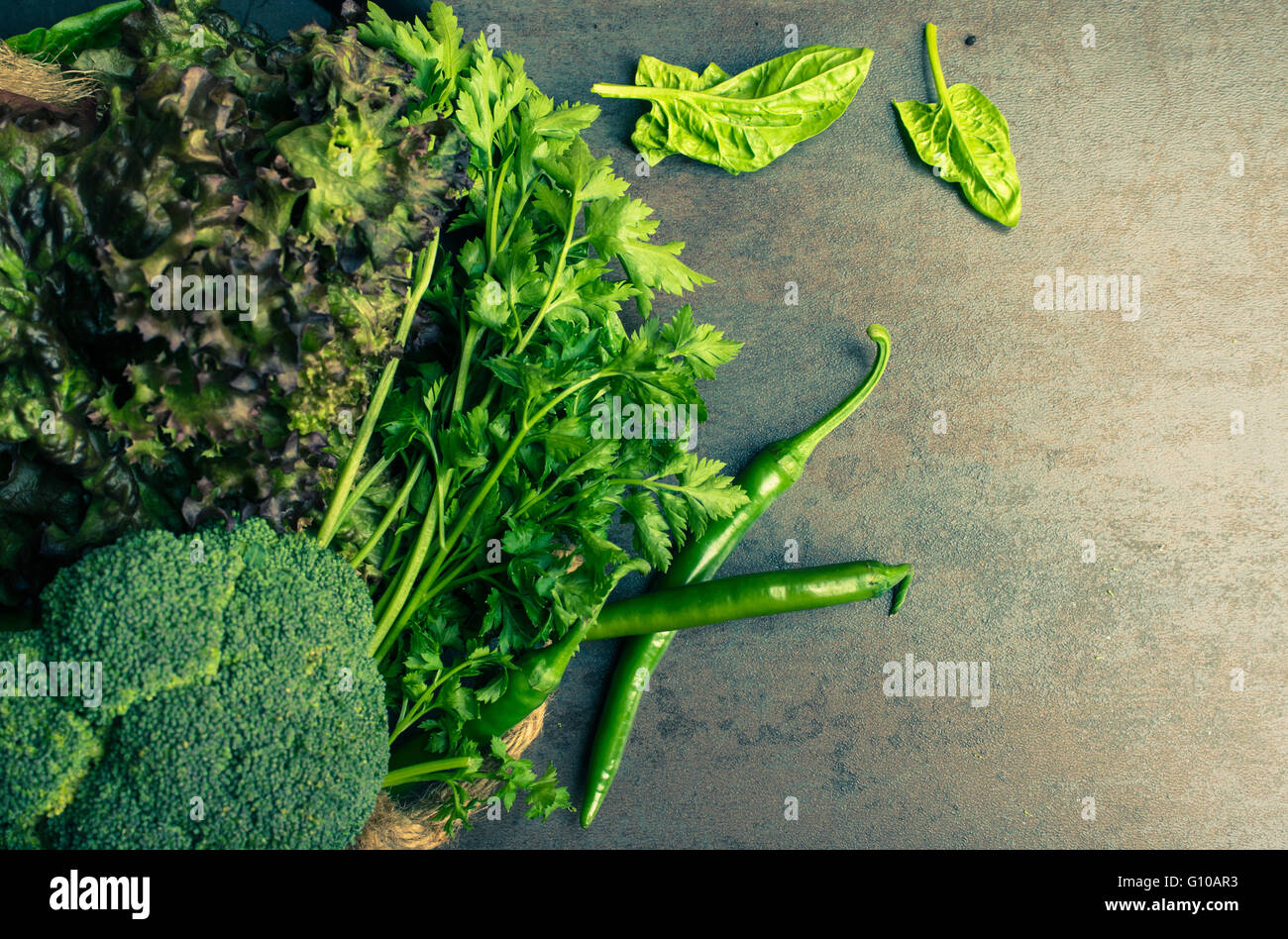 Healthy food with fresh ingredients for salad on rustic background ...