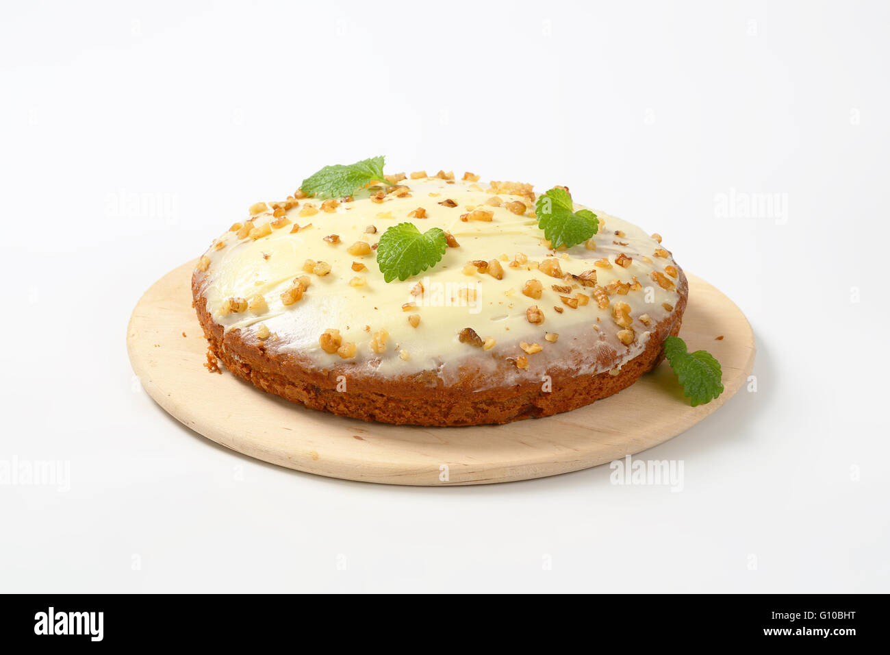 homemade gingerbread cake with cream cheese topping and chopped walnuts ...
