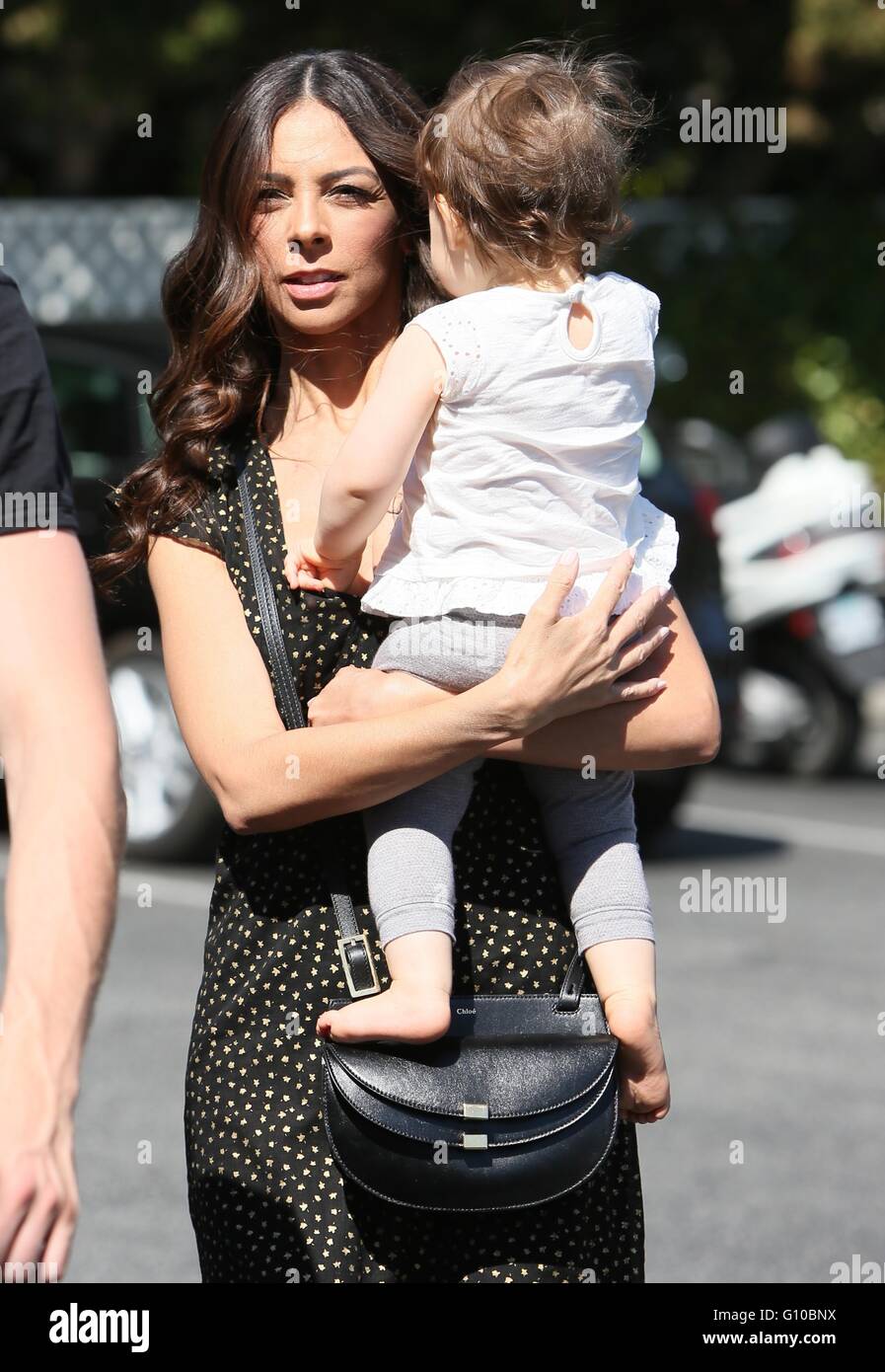 Terri Seymour and Clark Mallon visit Bristol Farms with their daughter ...