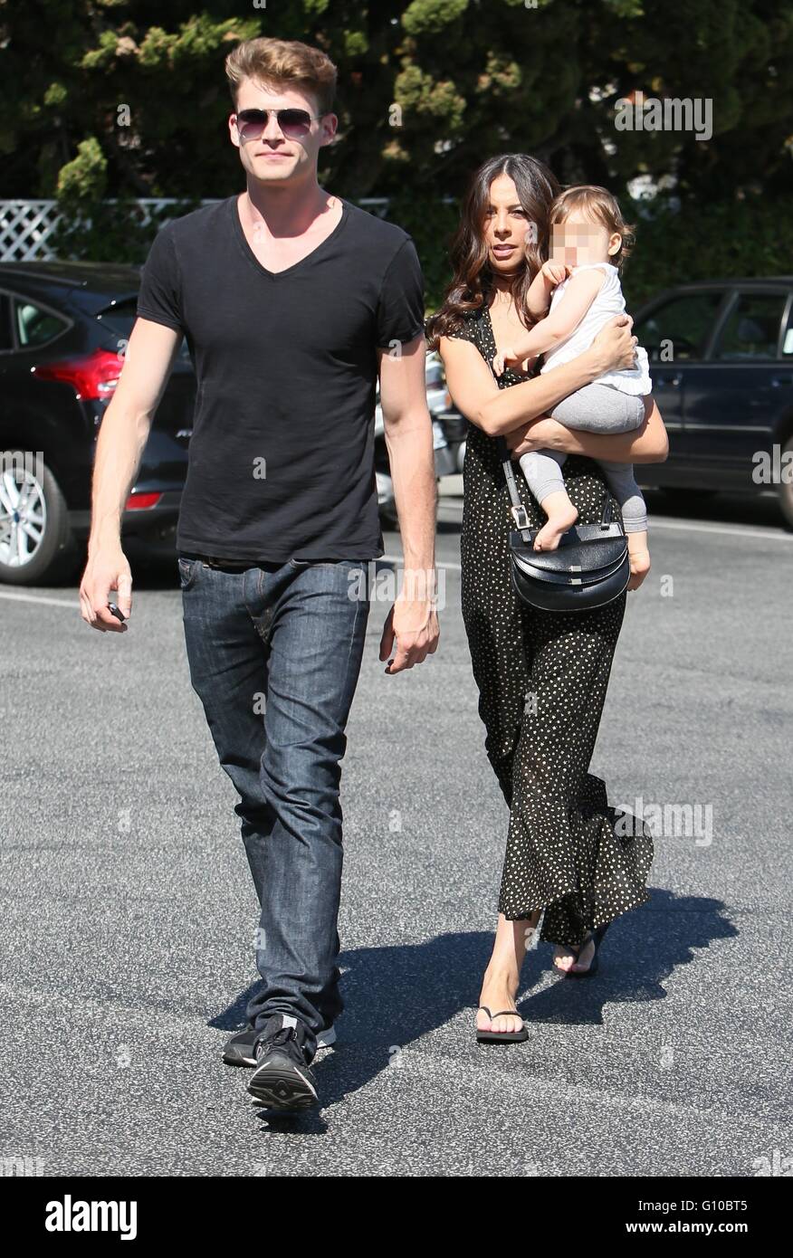 Terri Seymour and Clark Mallon visit Bristol Farms with their daughter ...