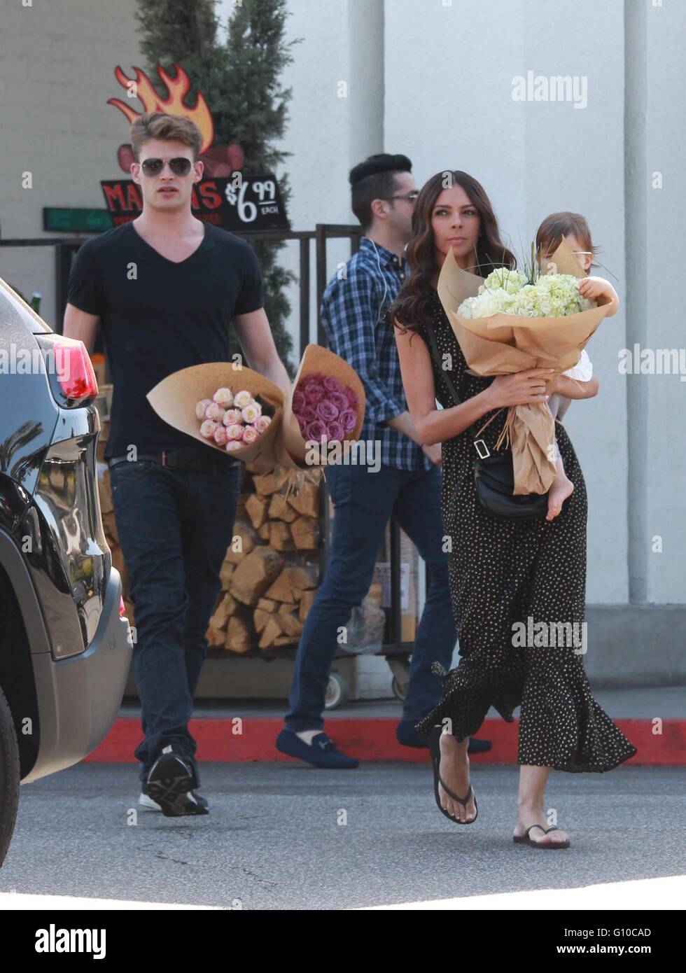 Terri Seymour and Clark Mallon visit Bristol Farms with their daughter ...