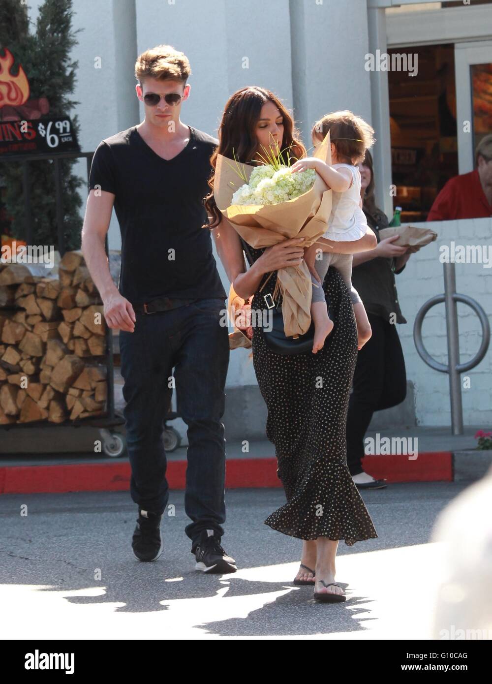 Terri Seymour and Clark Mallon visit Bristol Farms with their daughter ...
