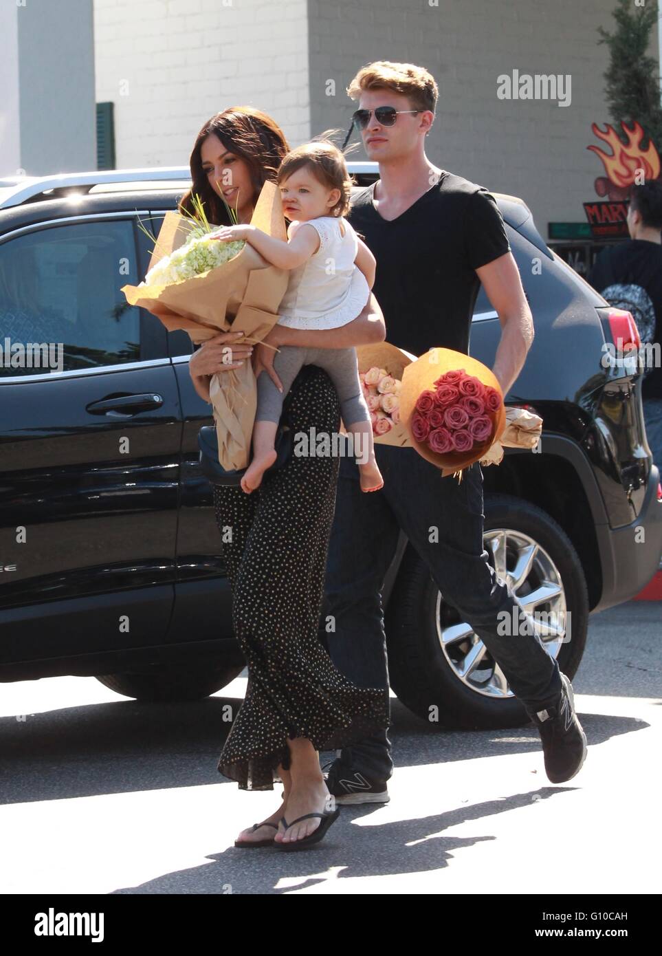 Terri Seymour and Clark Mallon visit Bristol Farms with their daughter ...