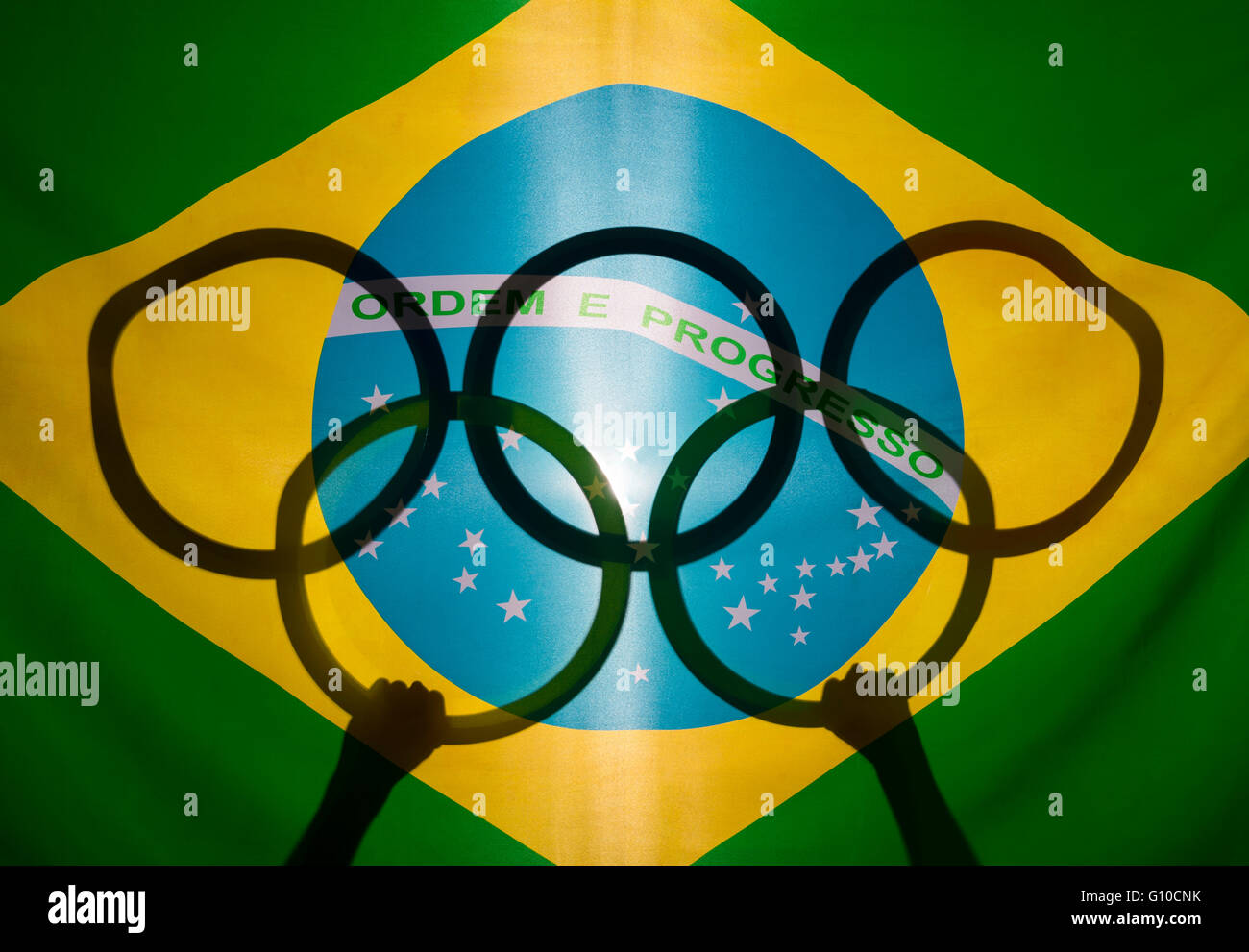RIO DE JANEIRO - FEBRUARY 3, 2016: Hands of an athlete hold Olympic ...