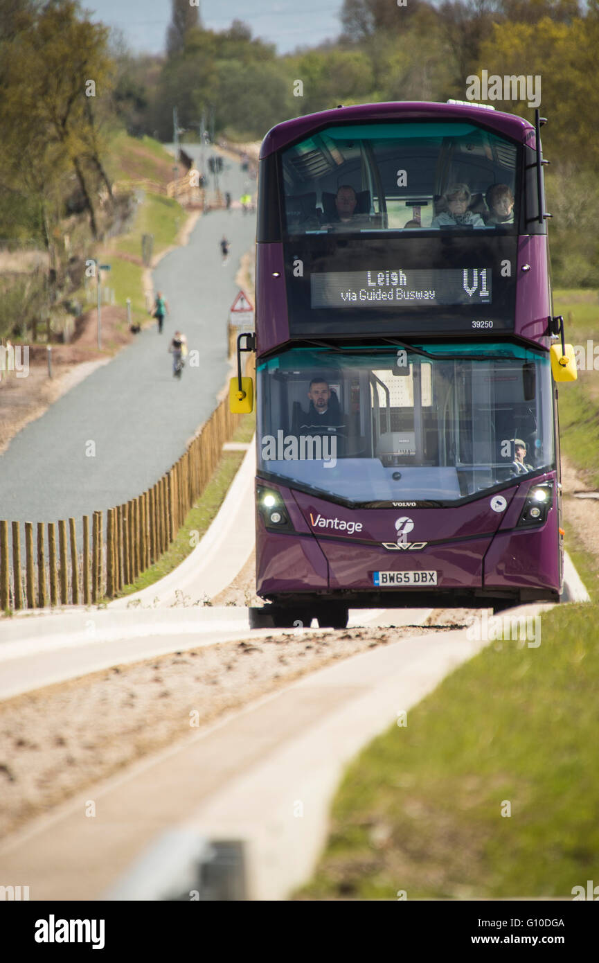 Purple bus on new guided busway driver and passengers visible Stock ...
