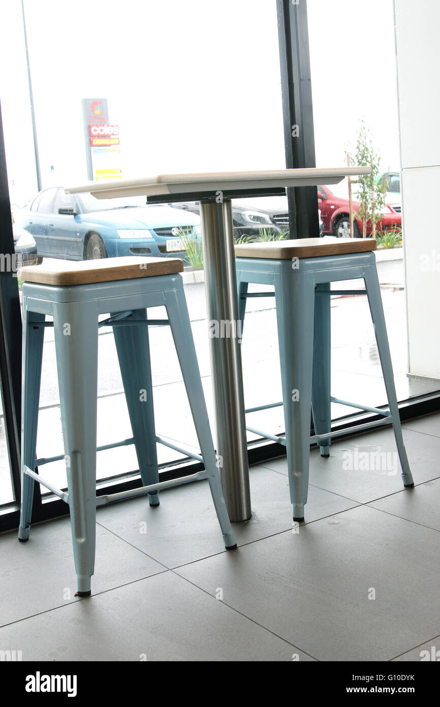 Dining setting 2 chairs and a table Stock Photo - Alamy