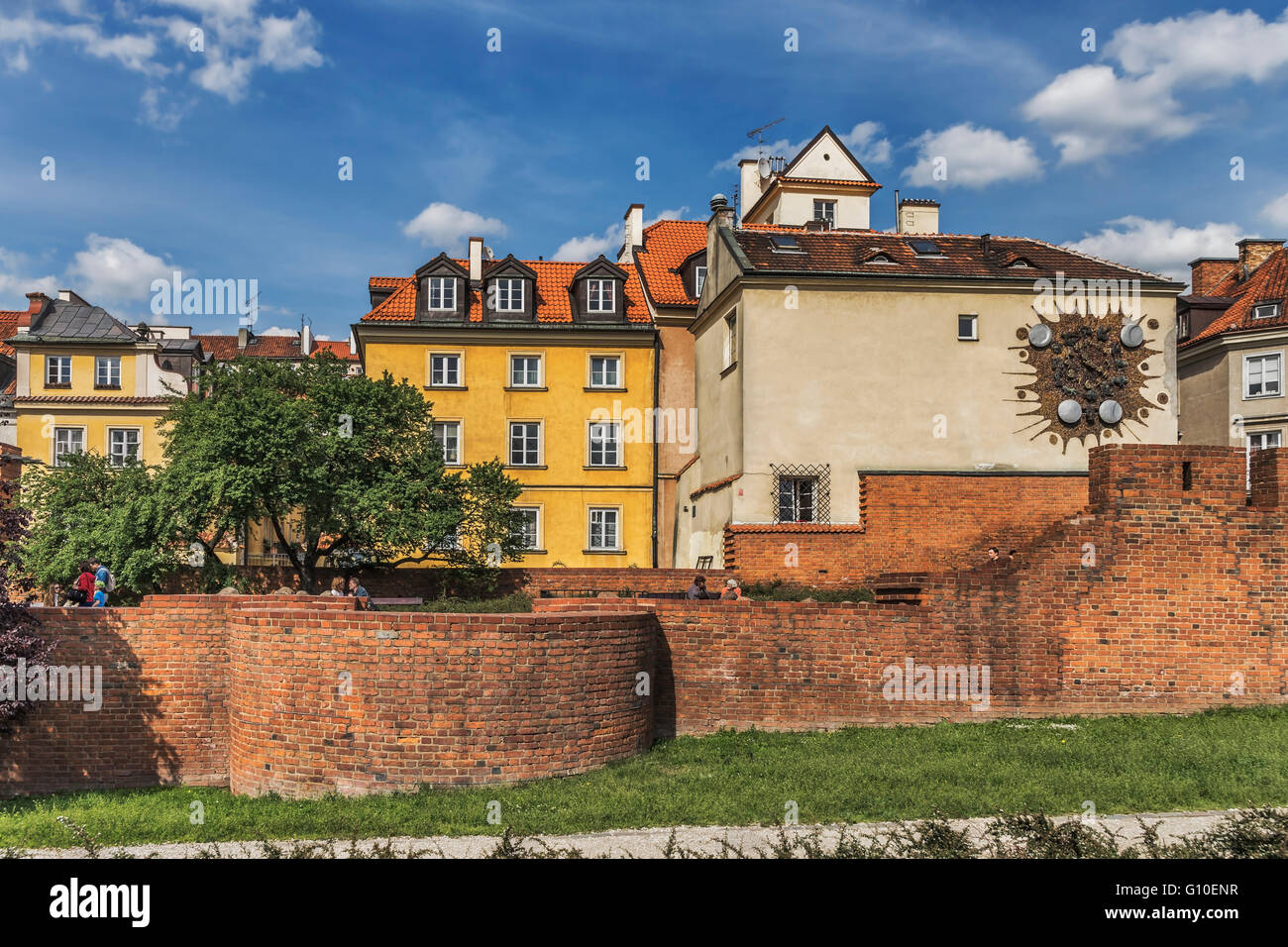 The old city wall is located in the old town of the Warsaw ...