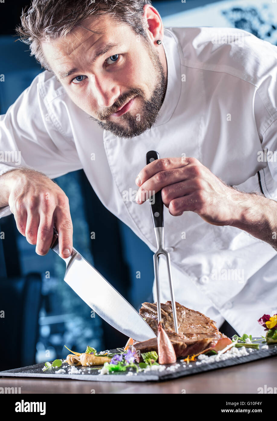 Cook Holding Plate Food In Stock Photos & Cook Holding Plate Food In ...