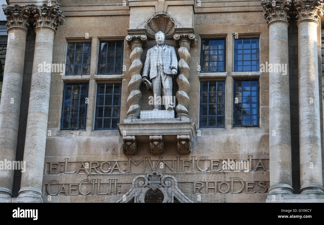 The statue of Cecil John Rhodes above the main door to Oriel College on High Street, Oxford ...