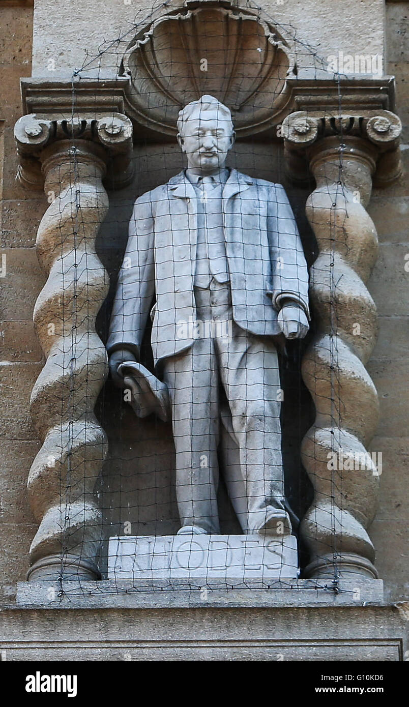 The statue of Cecil John Rhodes above the main door to Oriel College on High Street, Oxford ...