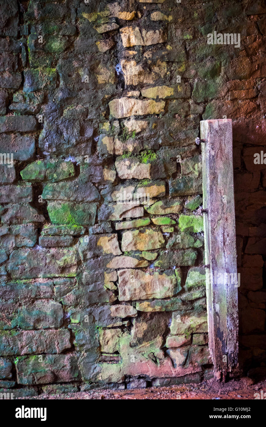 old damp stained wall with wooden post Stock Photo - Alamy