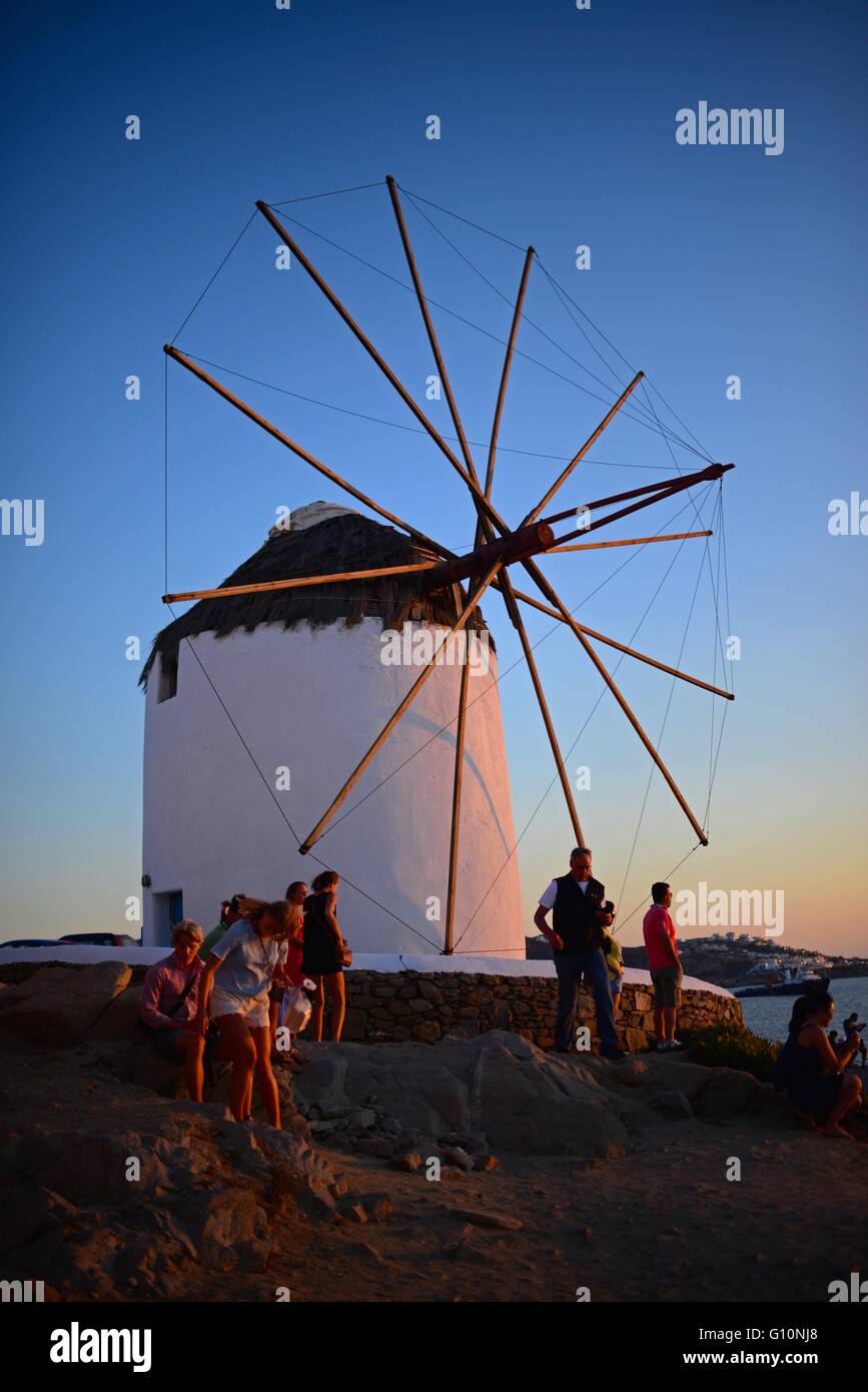 People enjoying sunset from traditional windmills (Kato Milli) in ...