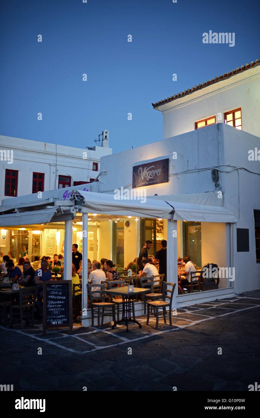 Restaurant terrace at night in Mykonos Stock Photo - Alamy