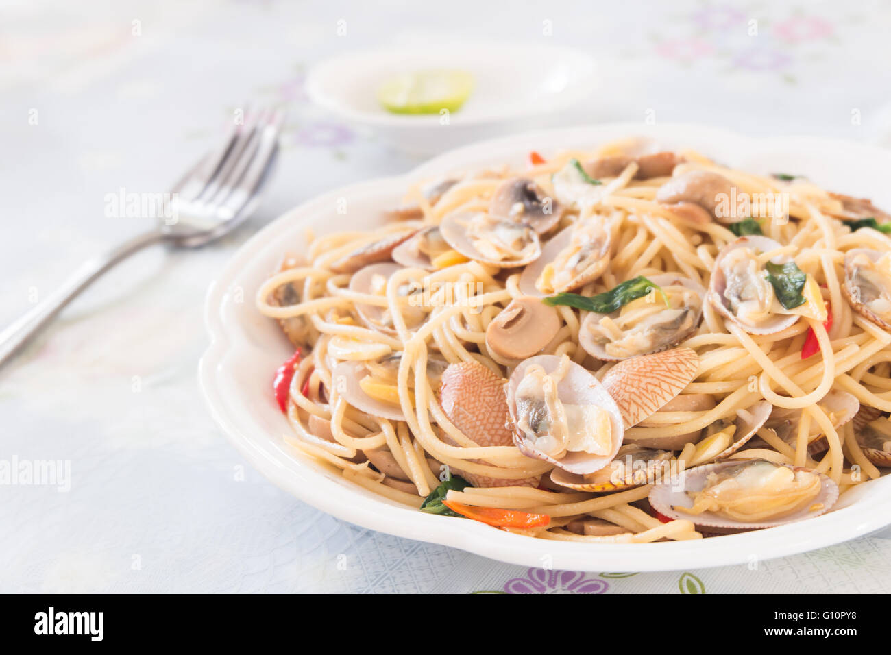 thai style spicy spaghetti with the clams Stock Photo - Alamy