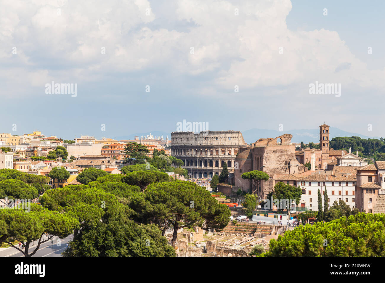 Rome cityscape with view of ruins and colosseum near Altare della ...