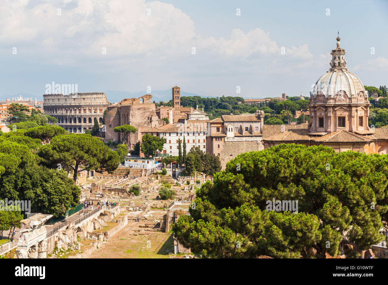 Rome cityscape with view of ruins and colosseum near Altare della ...