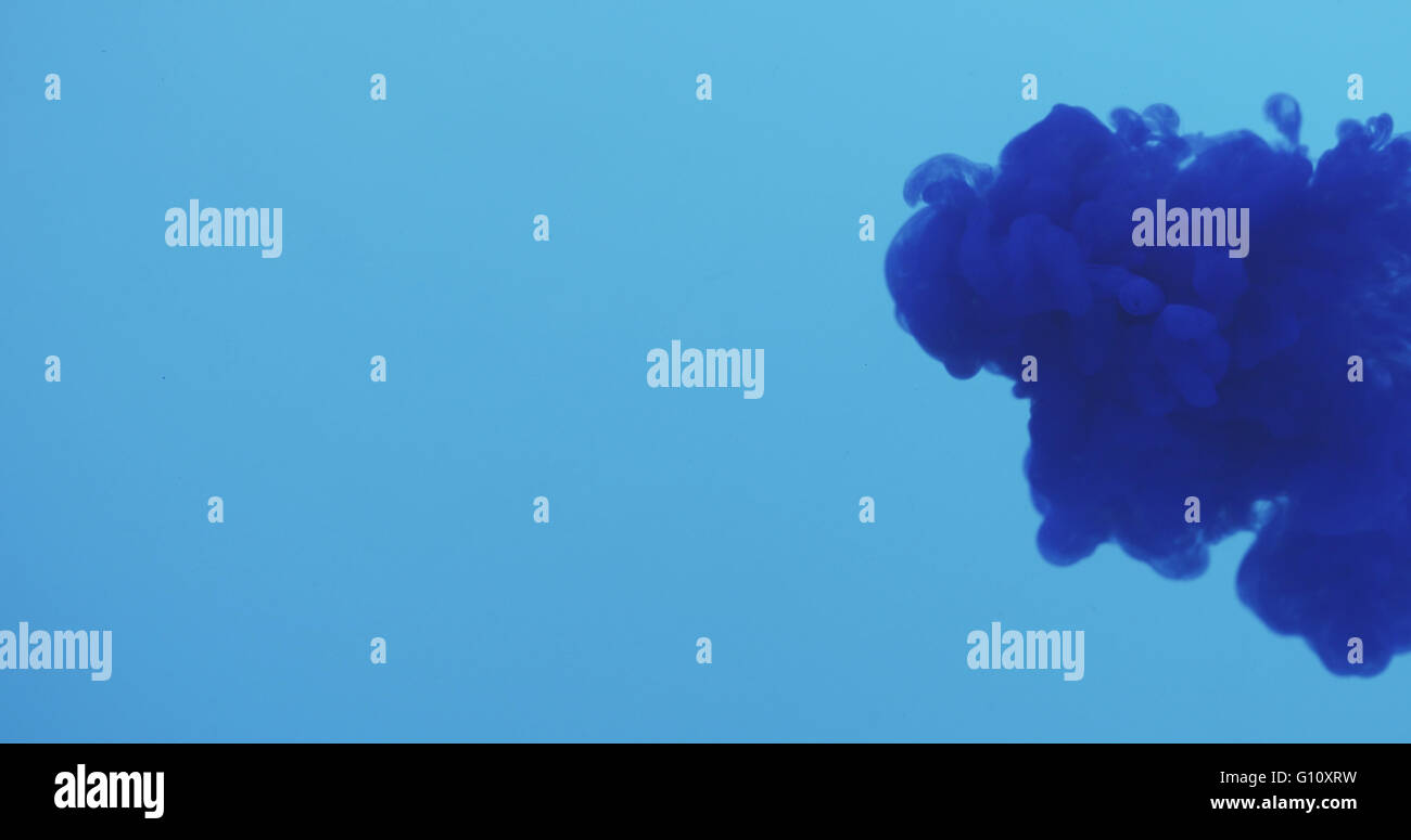 blue ink spreading in water Stock Photo - Alamy