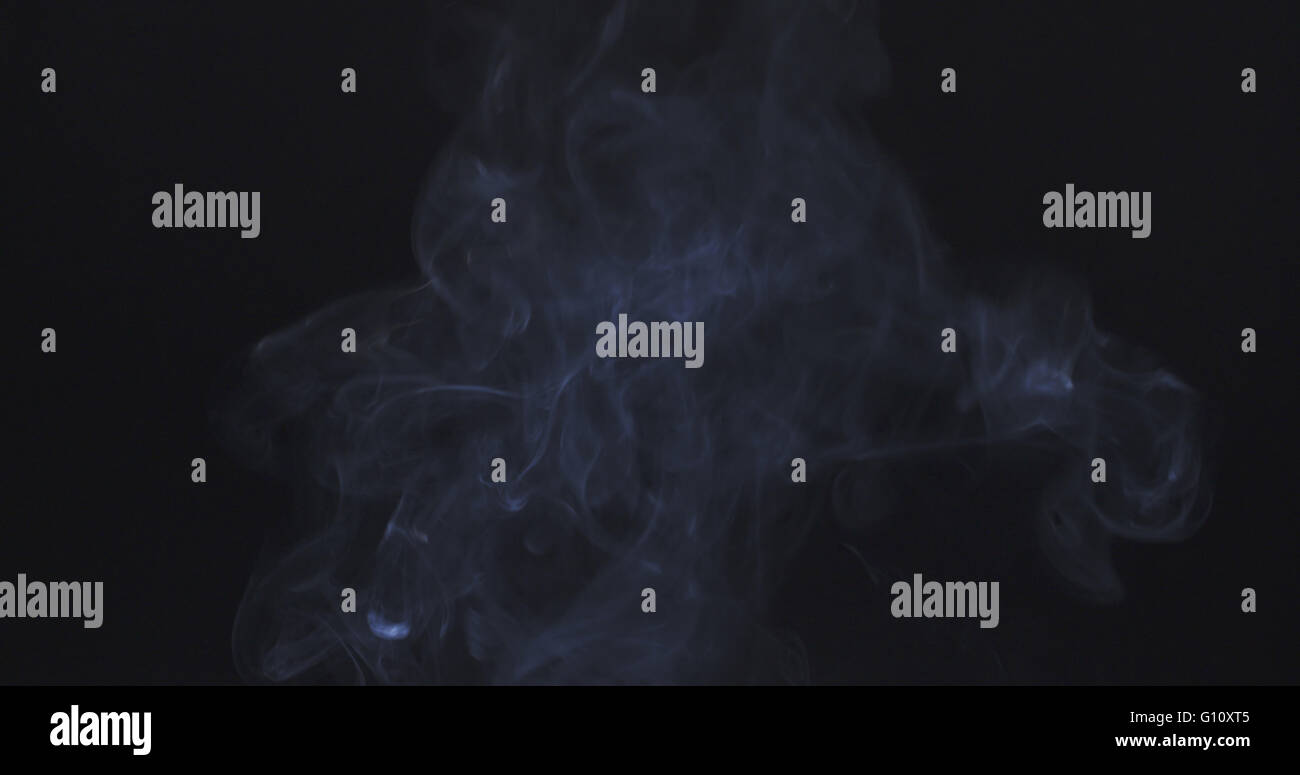 backlit smoke background over black Stock Photo - Alamy