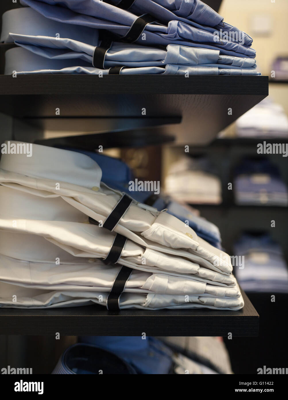 View of male shirts exposed in the clothes shop Stock Photo - Alamy