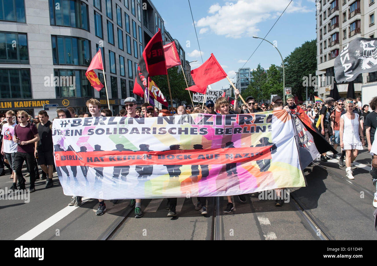 Participants in a counter-demonstration walk through Berlin, Germany ...