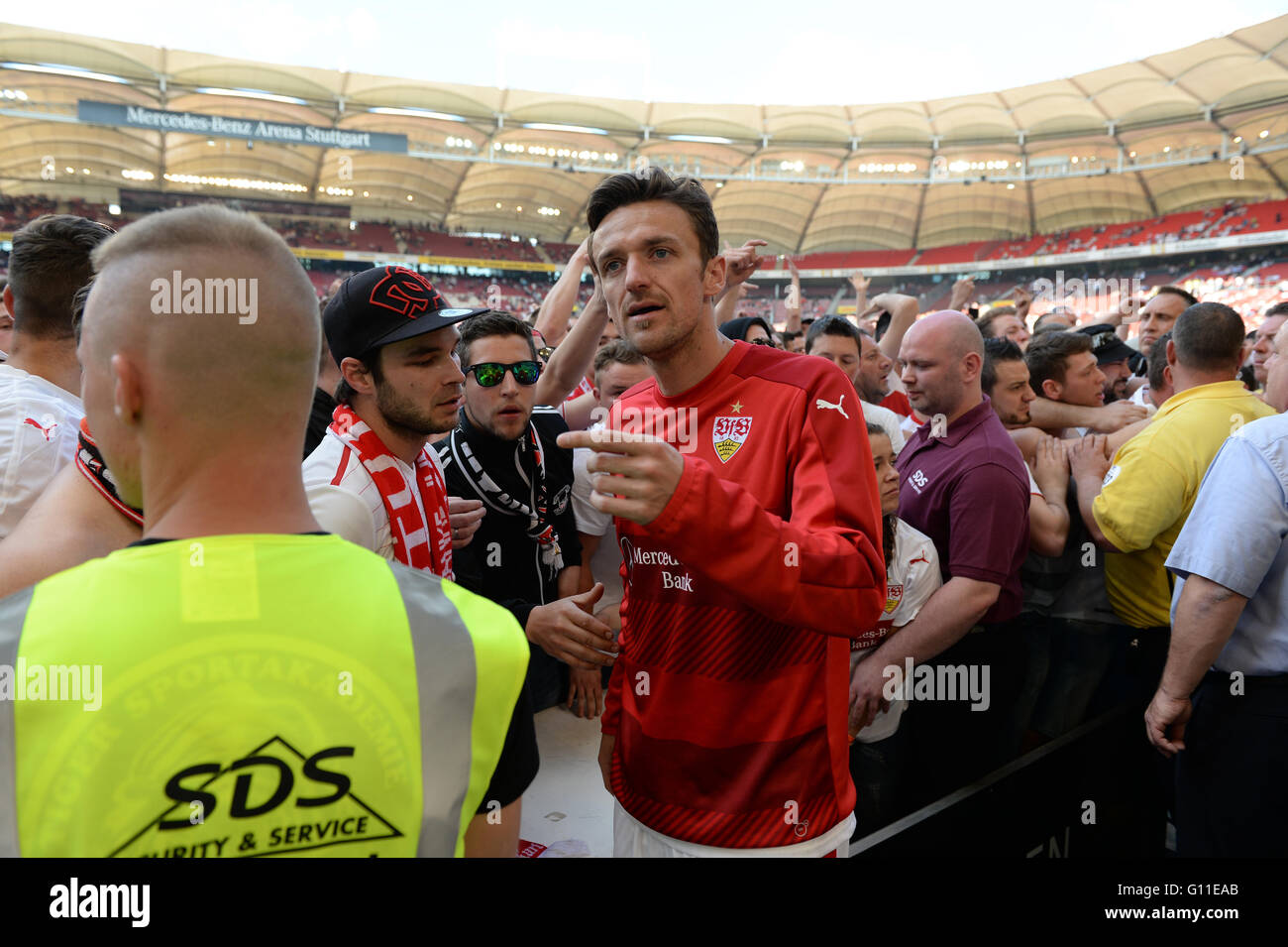 Stuttgart's Christian Gentner faces the depleted fans after the German ...