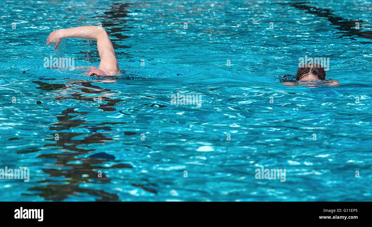 Berlin, Germany. 07th May, 2016. A man and woman swim laps in the pool ...