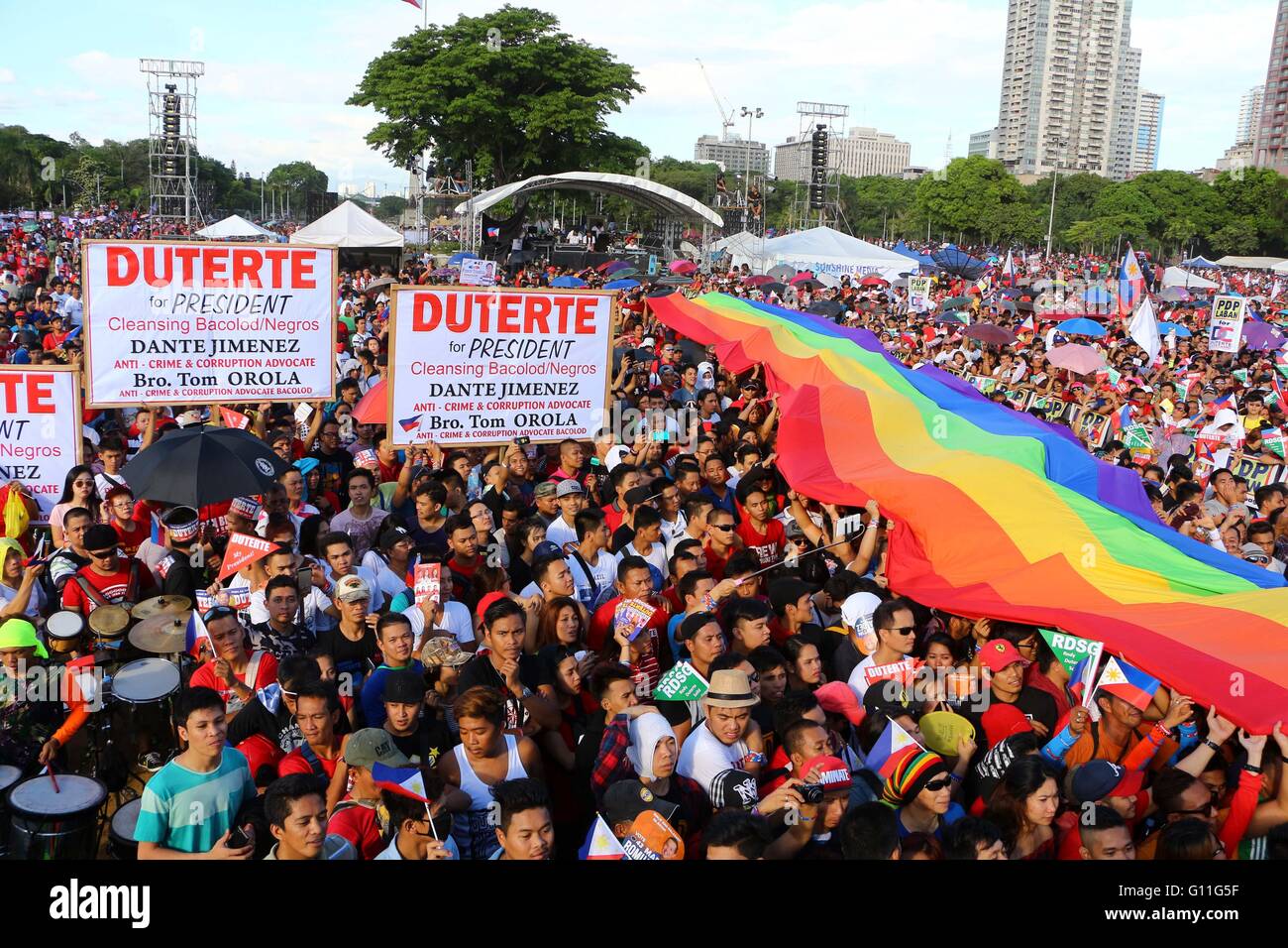 Philippines. 07th May, 2016. Giant LGBT group flag passing through the ...