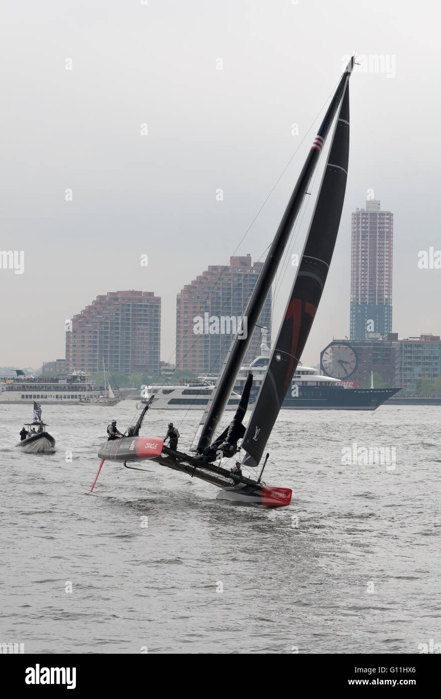 Front view of Oracle USA team sailing yacht foiling in the 2016 America ...
