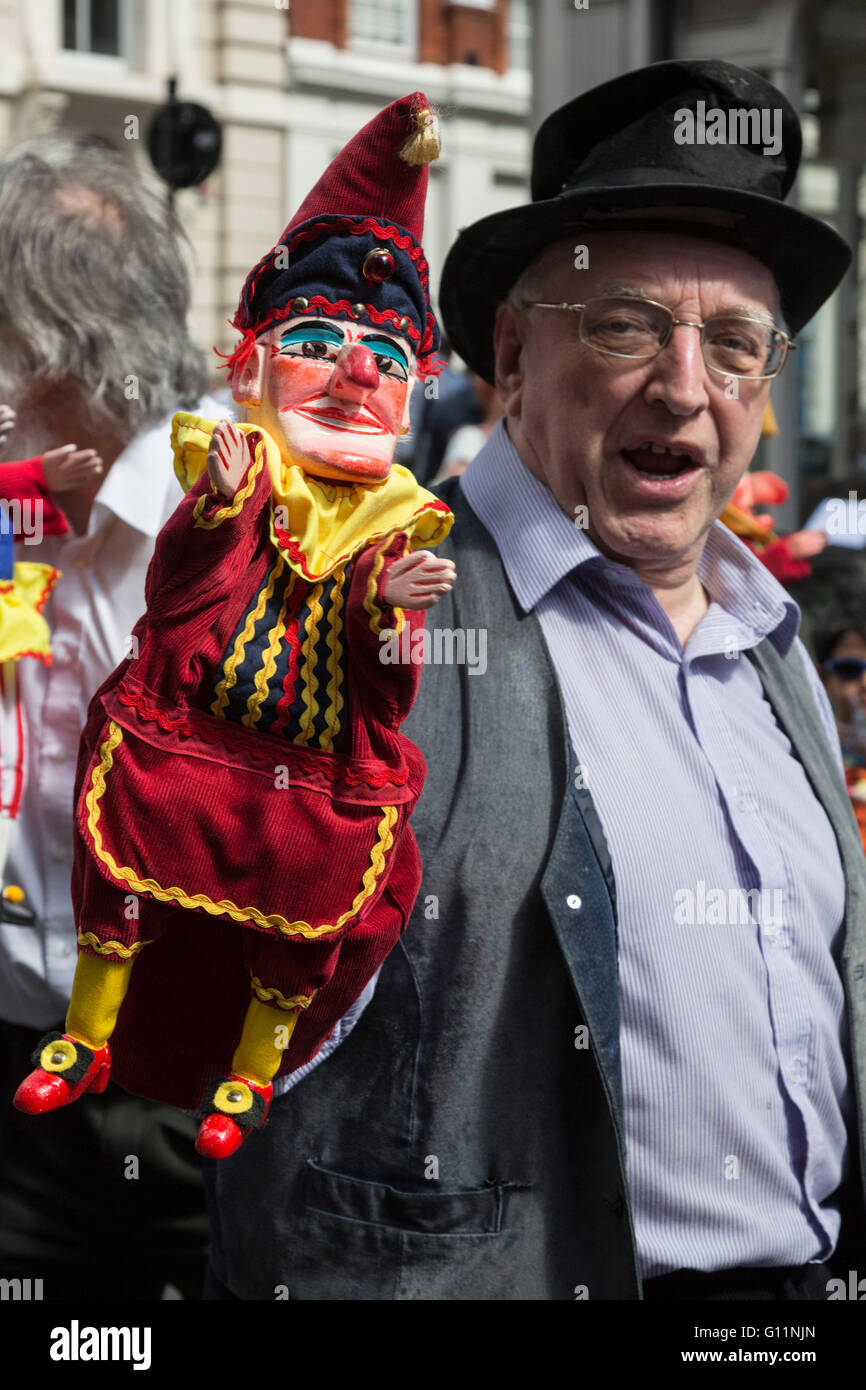 London, UK. 8 May 2016. Puppeteers parade through Covent Garden. The ...