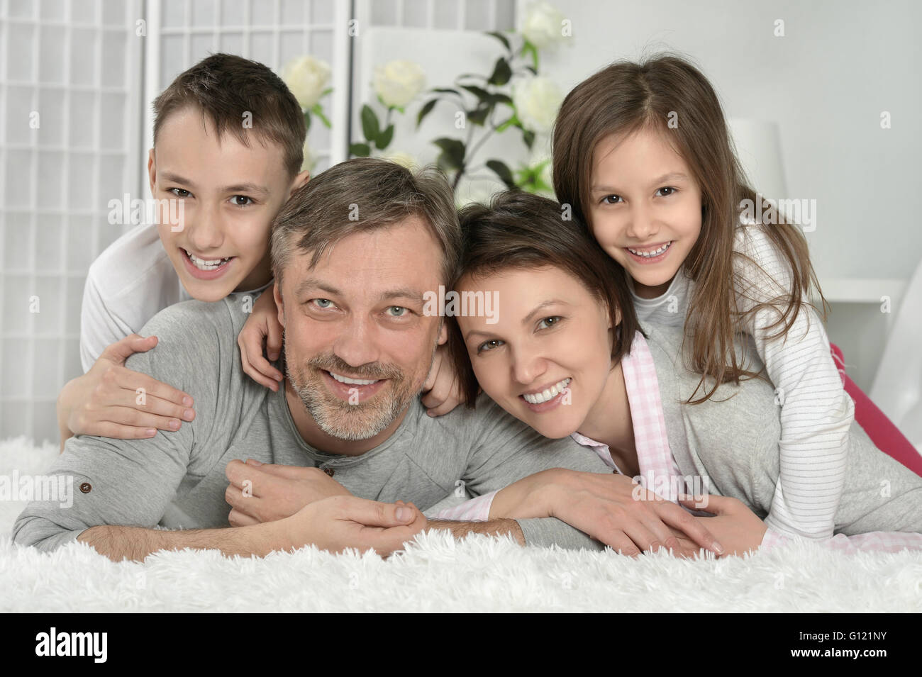 happy parents with kids Stock Photo - Alamy