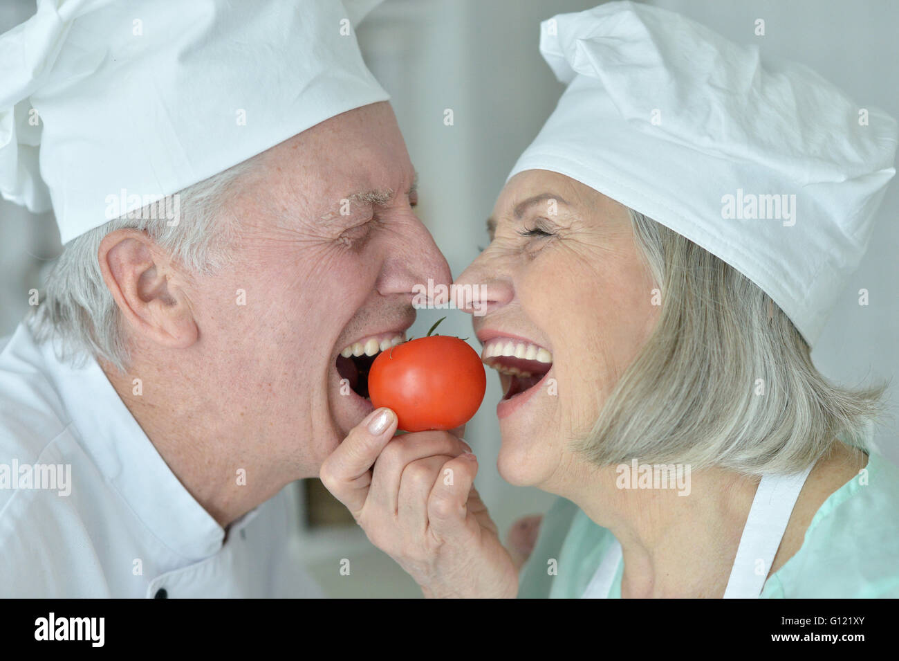 Senior chefs couple Stock Photo - Alamy